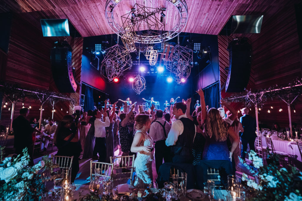 Groom Plays Electric Guitar On Stage at Modern Music Hall Wedding ...